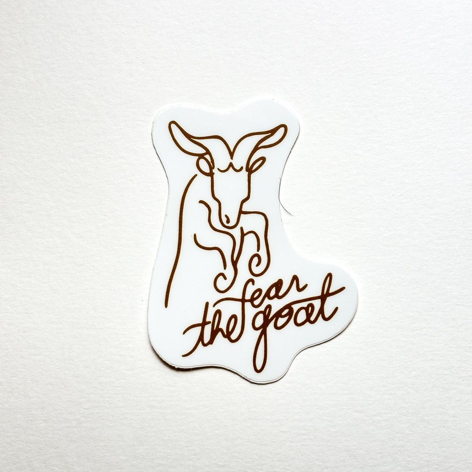 Fear the Goat Sticker – Easel on Stribling Shop